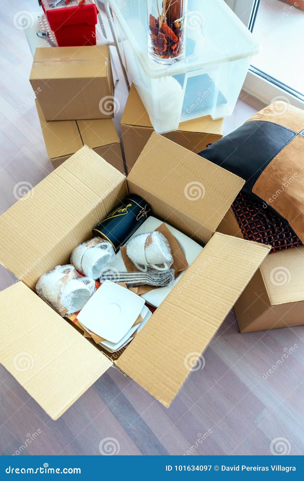 Living Room with Stack of Moving Boxes Stock Image - Image of aerial ...