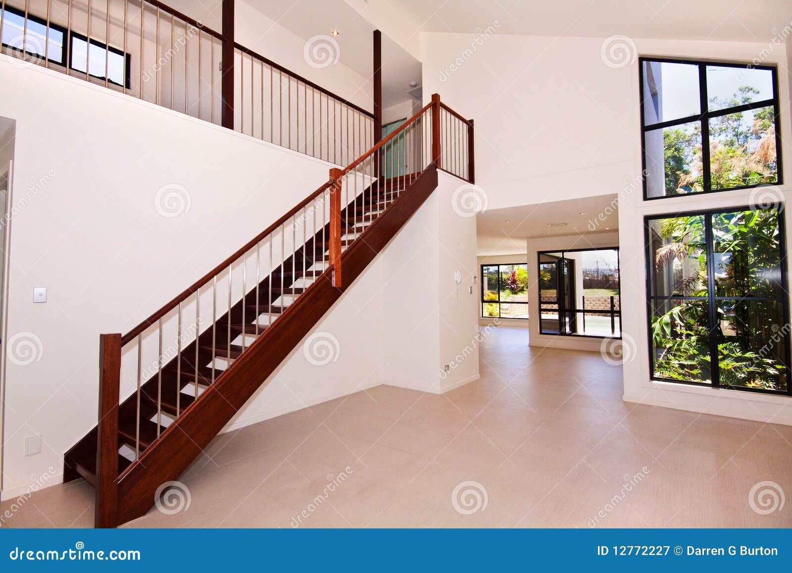 Living Room with Staircase stock image. Image of room - 12772227