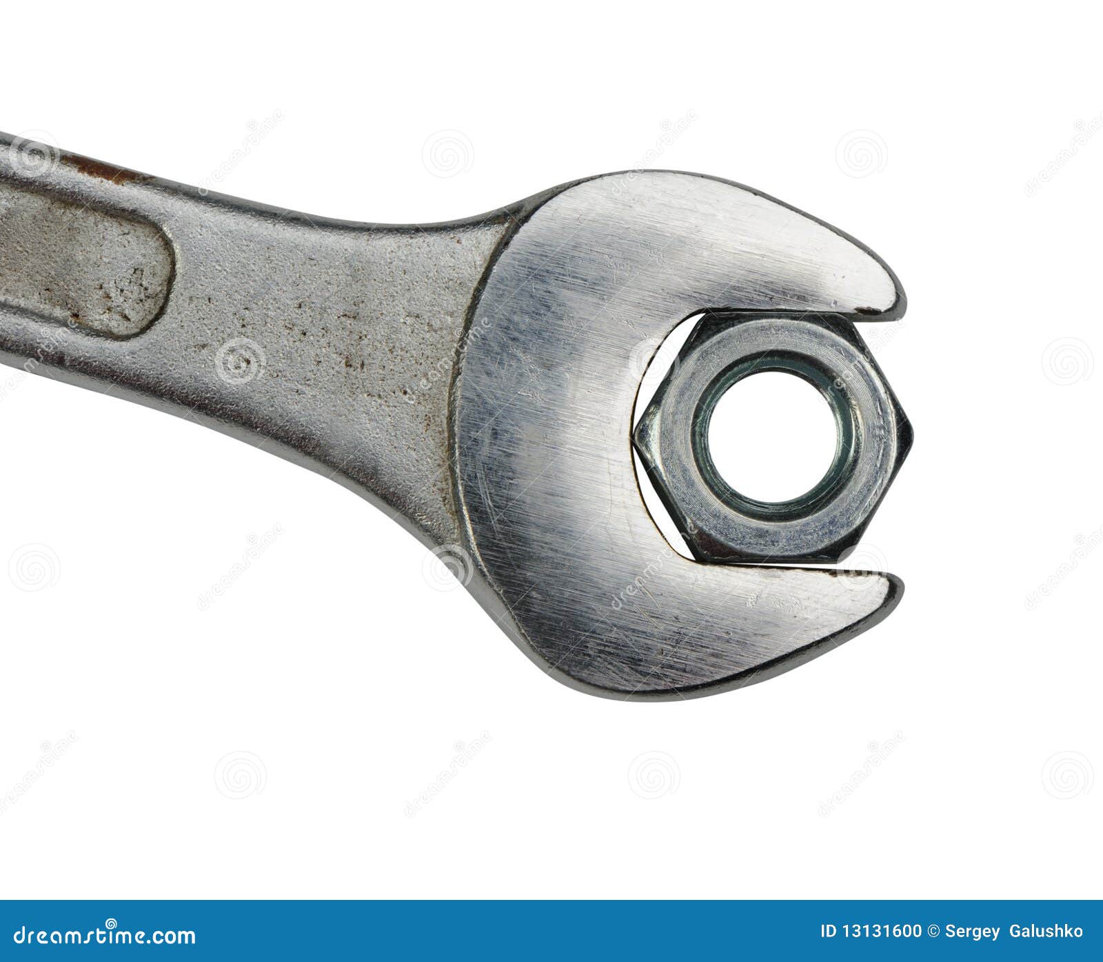 Llave con una tuerca foto de archivo. Imagen de forma - 13131600