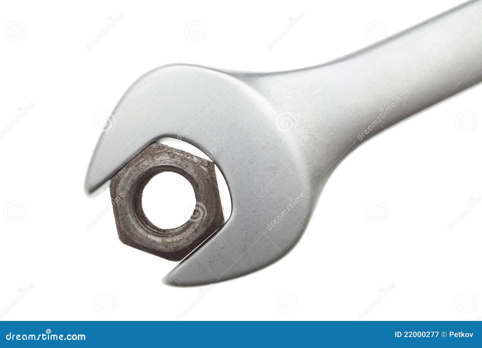 Llave con una tuerca imagen de archivo. Imagen de blanco - 22000277