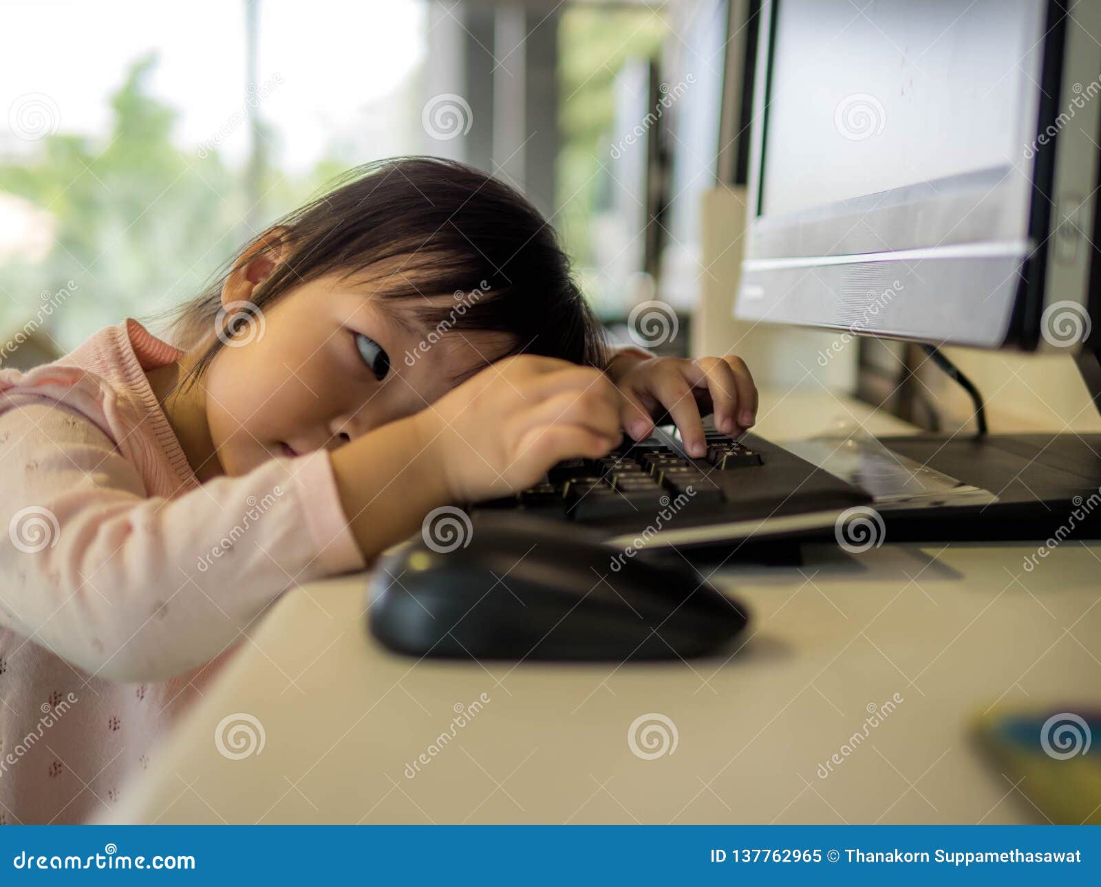 Llittle Girl Sitting With Computer, This Immage Can Use For Education ...