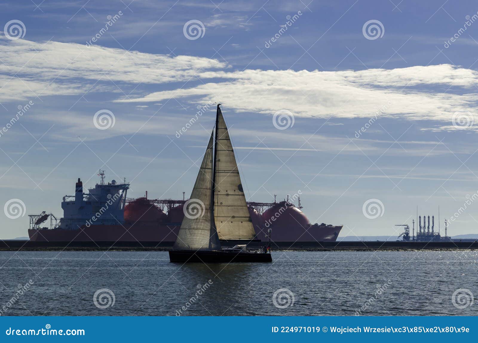 SAILBOAT and LNG TANKER editorial stock image. Image of maritime ...