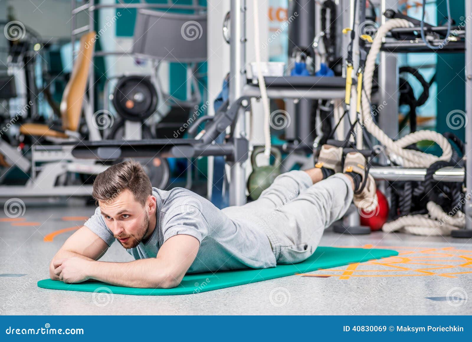 Load on the Biceps of Dumbbells. Successful Athlete Working Out Stock ...