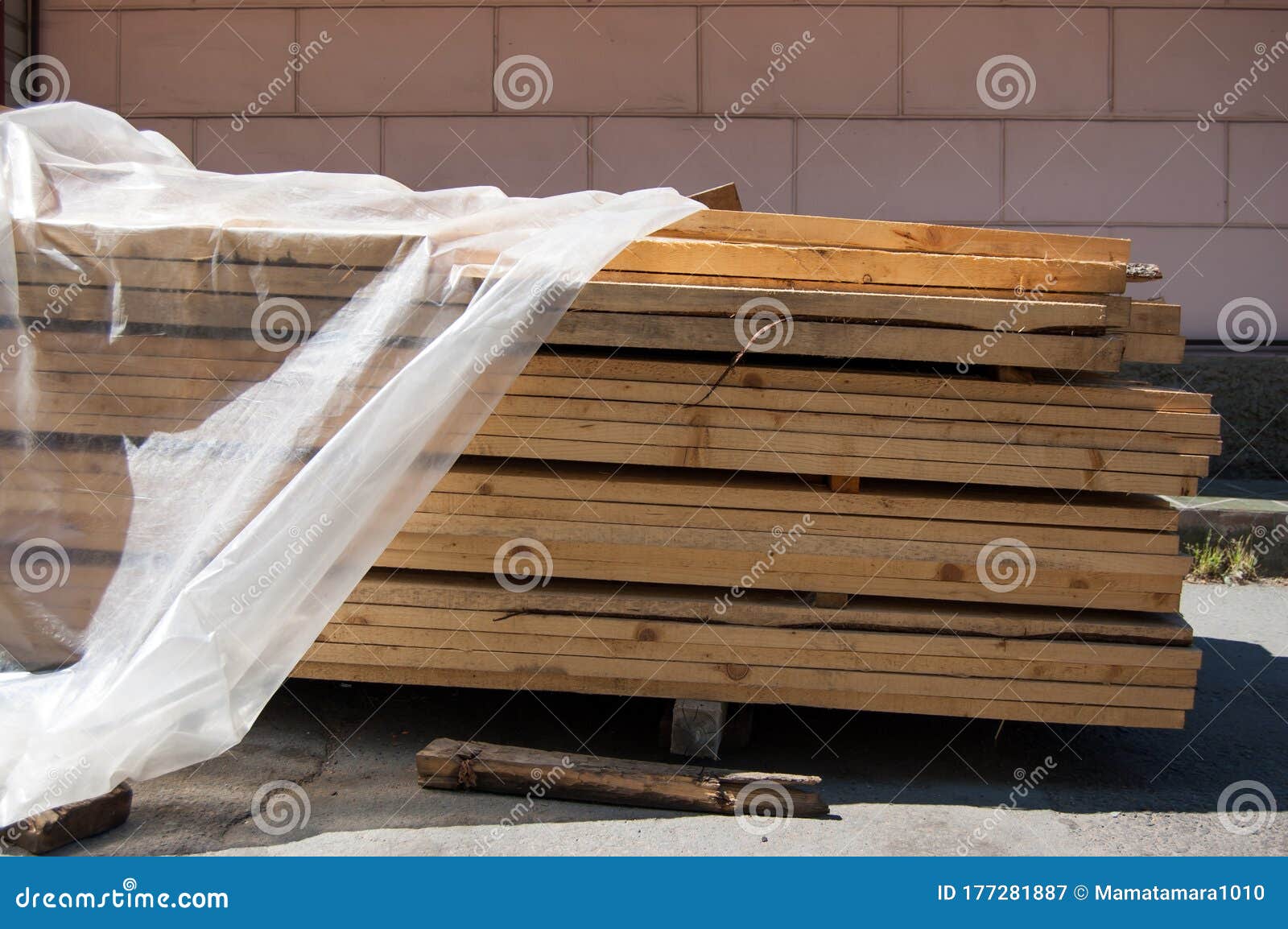 Load of Boards Partially Covered with Plastic Wrap for Weather ...