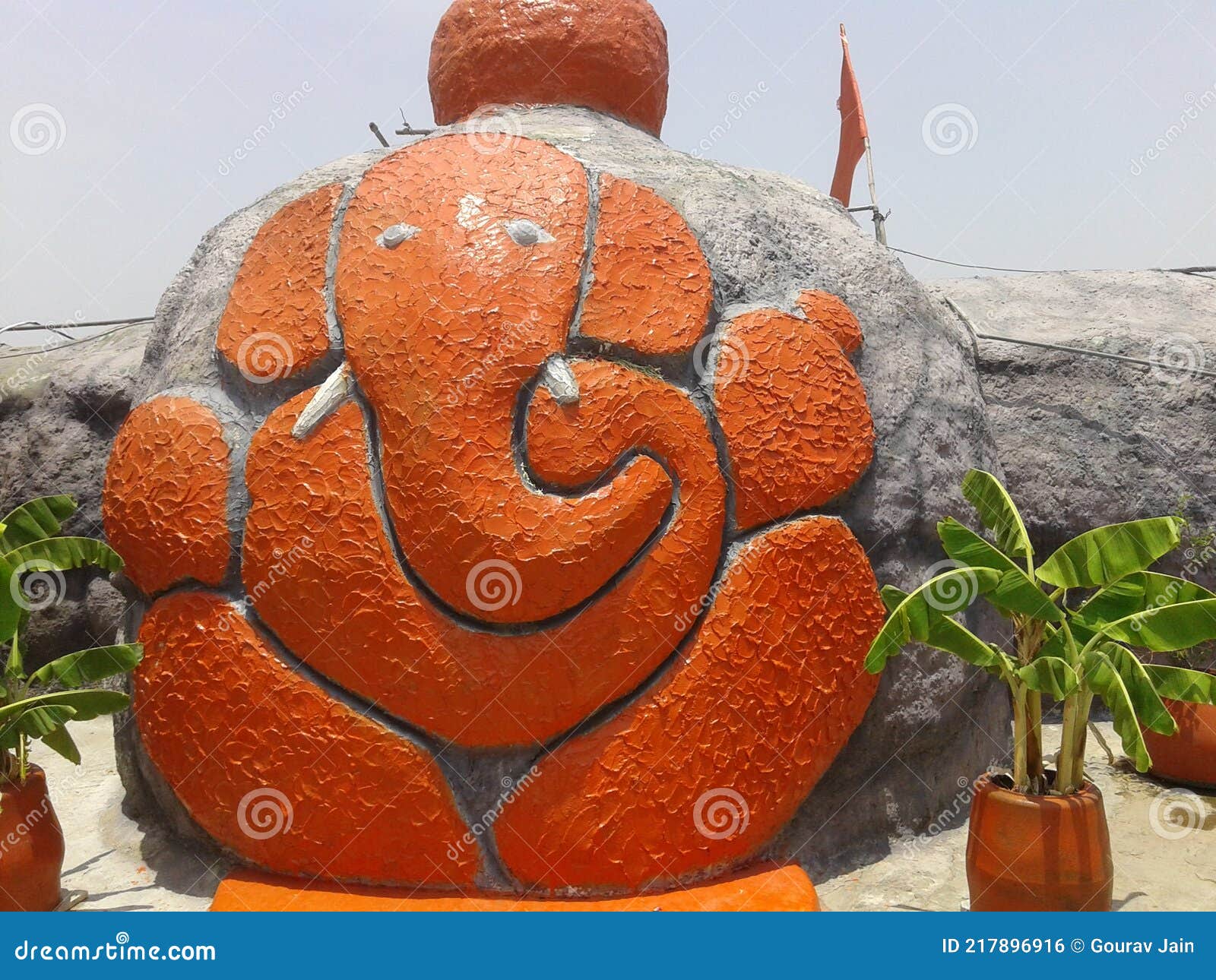 Load Ganesha Structure Orange Colour Ang Small Banana Tree Both Sides ...