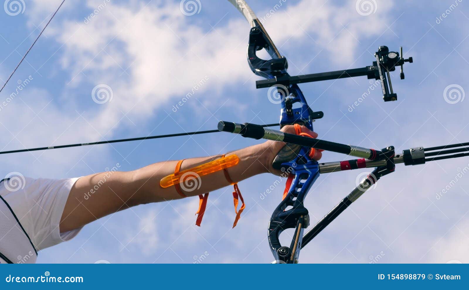 Loaded Compound Bow with the Pulled String in Male Hands. Shooting with ...