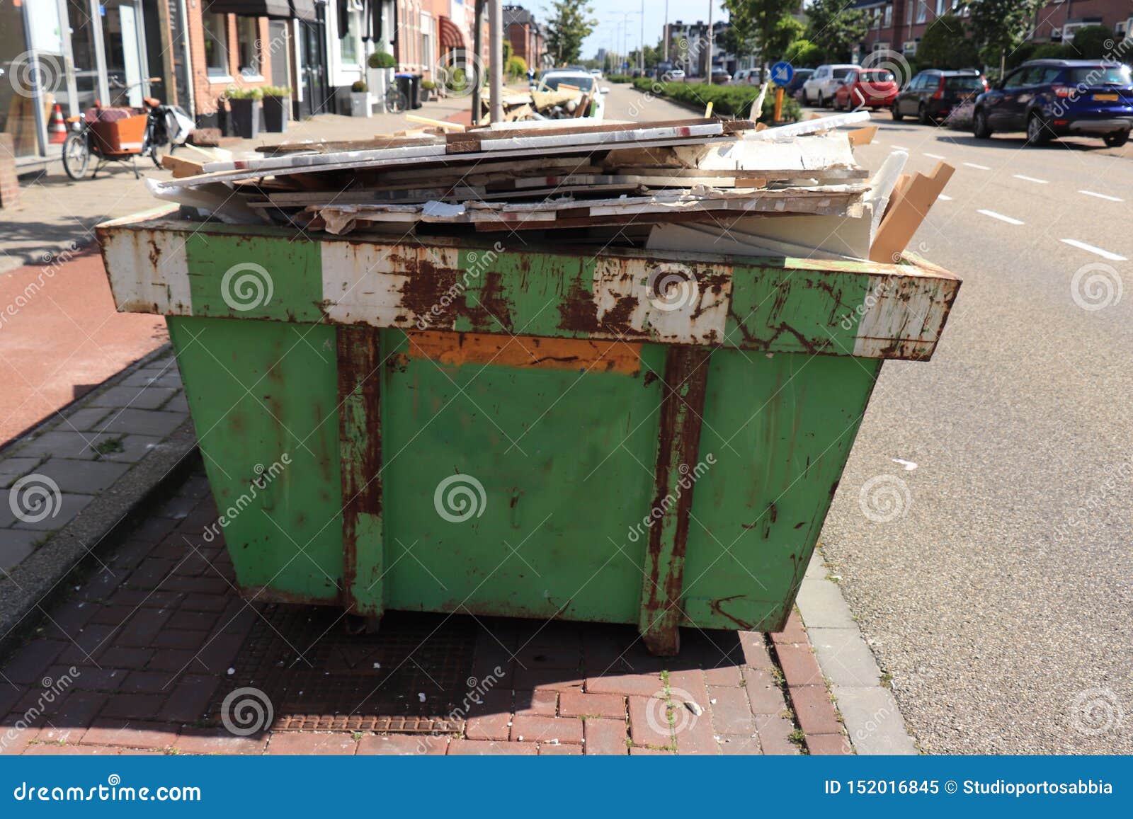 Loaded garbage dumpster stock image. Image of cement - 152016845