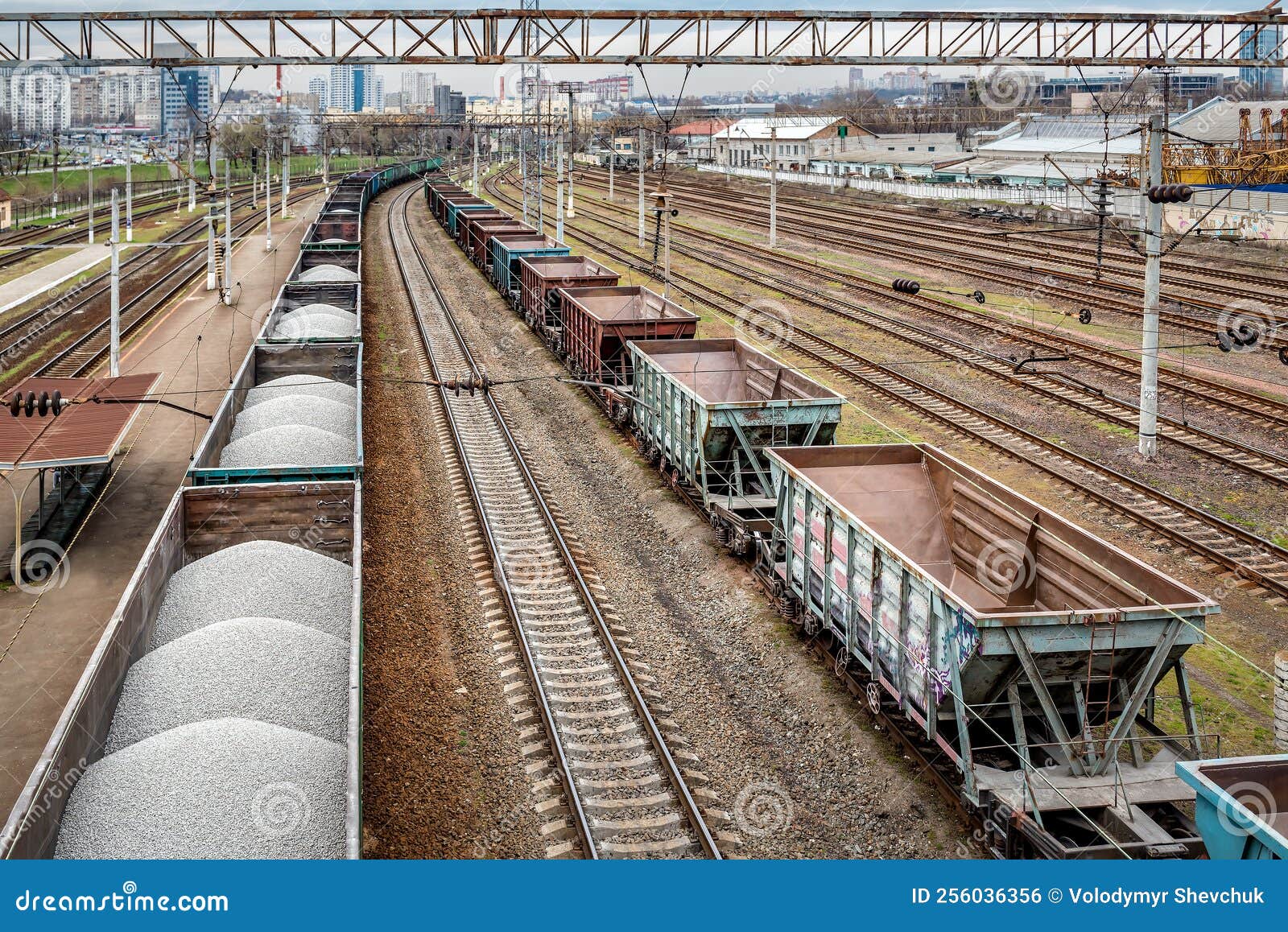 Loaded and Empty Freight Trains Stock Photo - Image of freight, hauling ...
