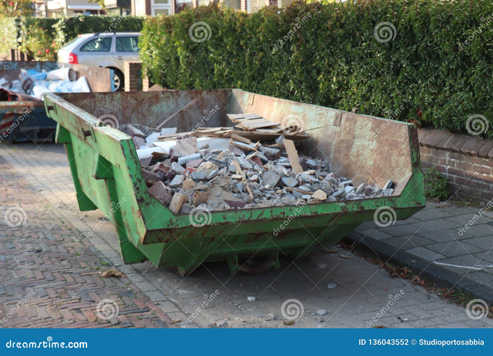 Loaded garbage dumpster stock photo. Image of brick - 136043552