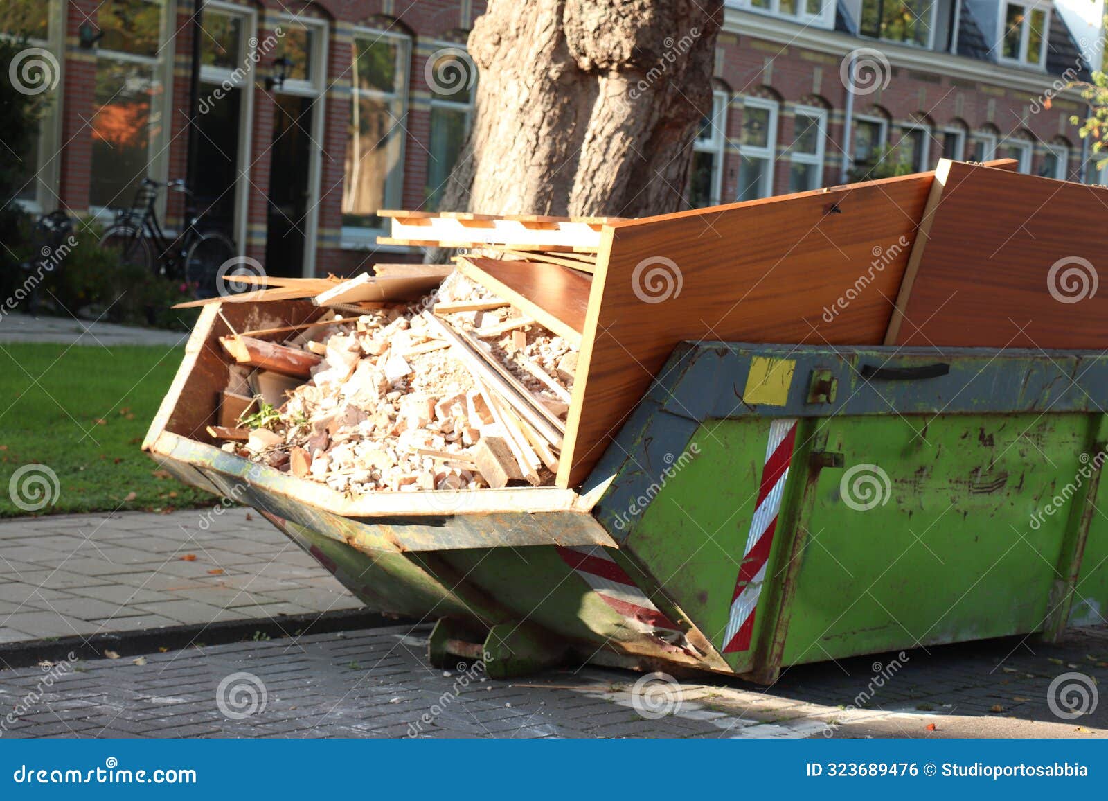 Loaded garbage dumpster stock photo. Image of plastic - 323689476
