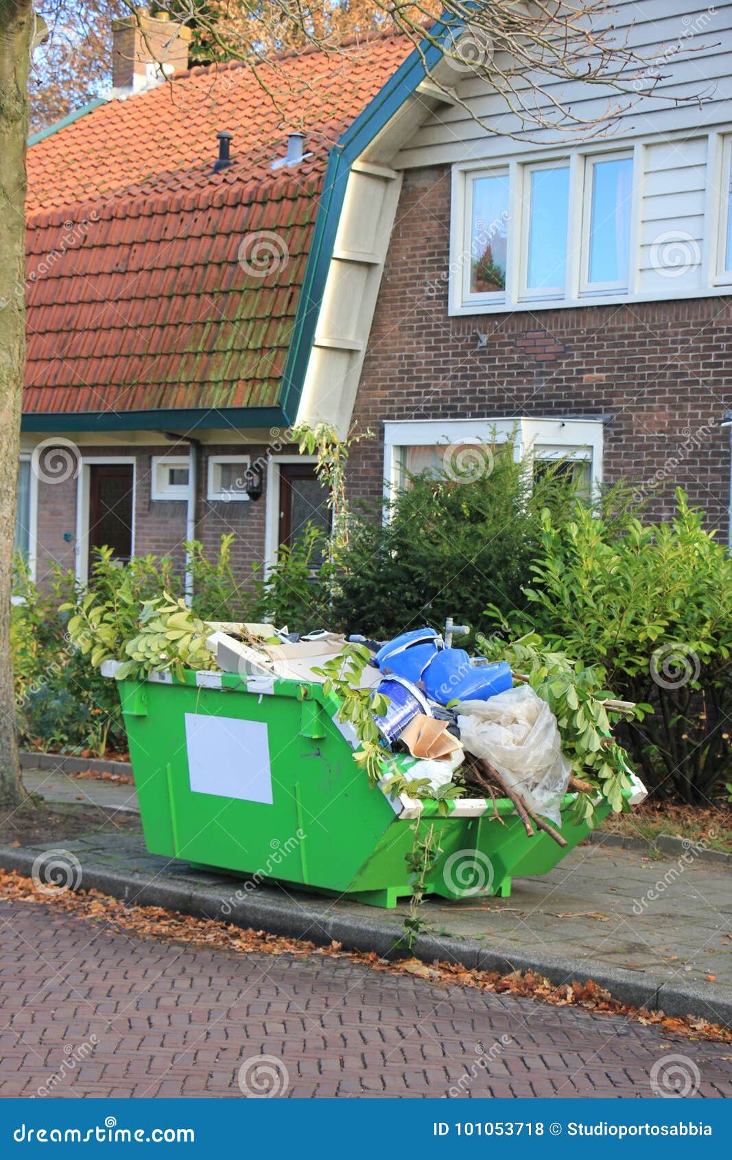 Loaded garbage dumpster stock photo. Image of building - 101053718