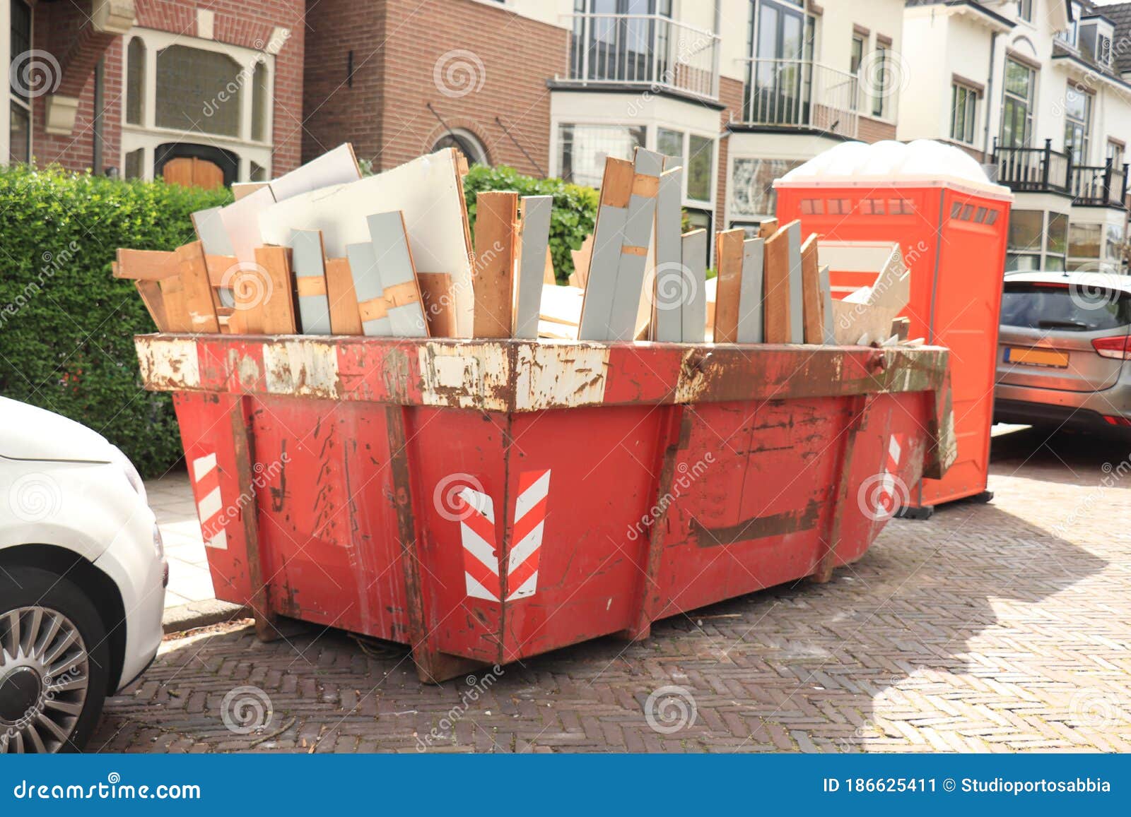 Loaded garbage dumpster stock image. Image of plastic - 186625411