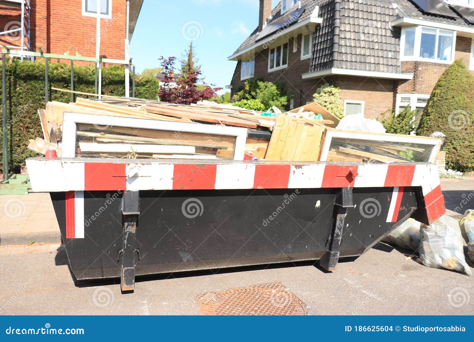 Loaded garbage dumpster stock photo. Image of chute - 186625604