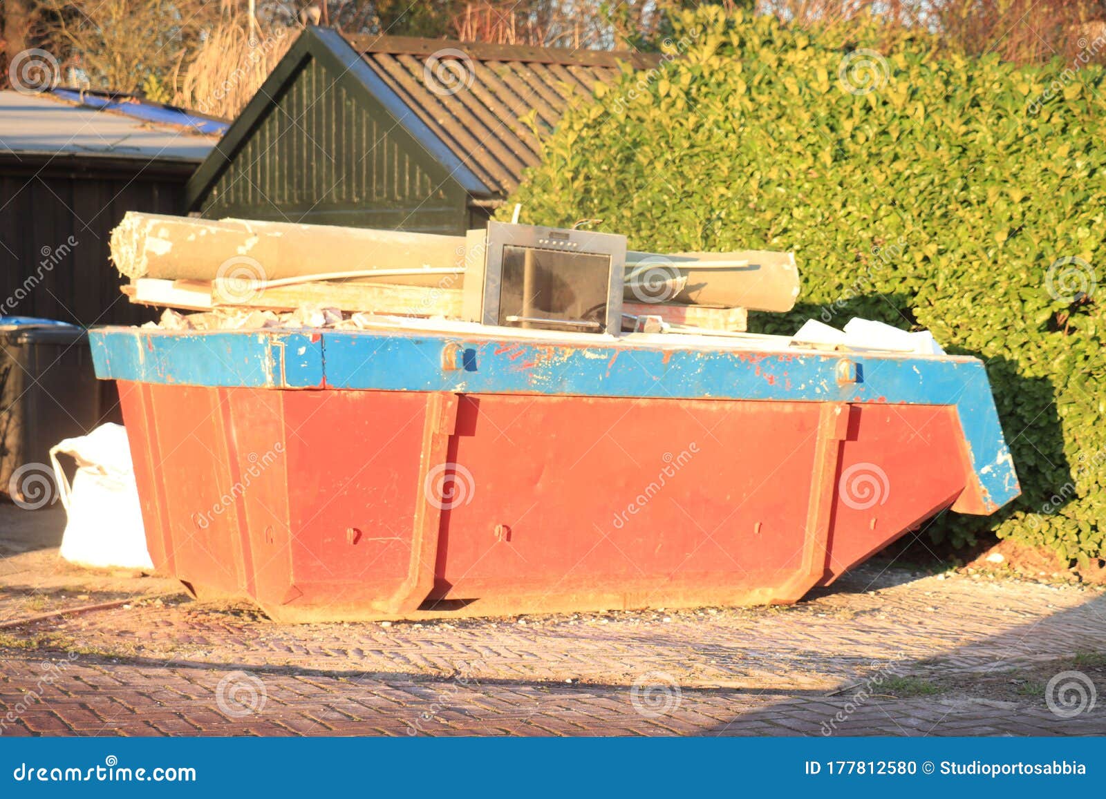 Loaded garbage dumpster stock photo. Image of dumpster - 177812580
