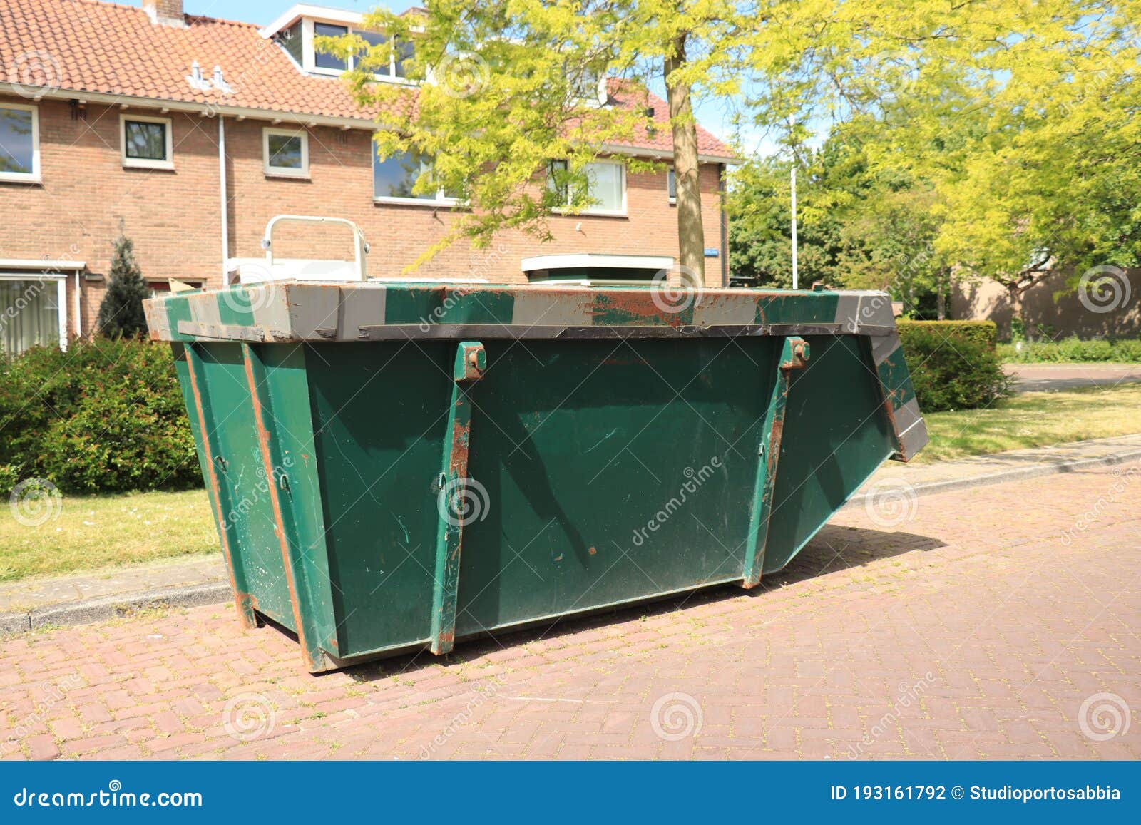 Loaded garbage dumpster stock photo. Image of dumpster - 193161792