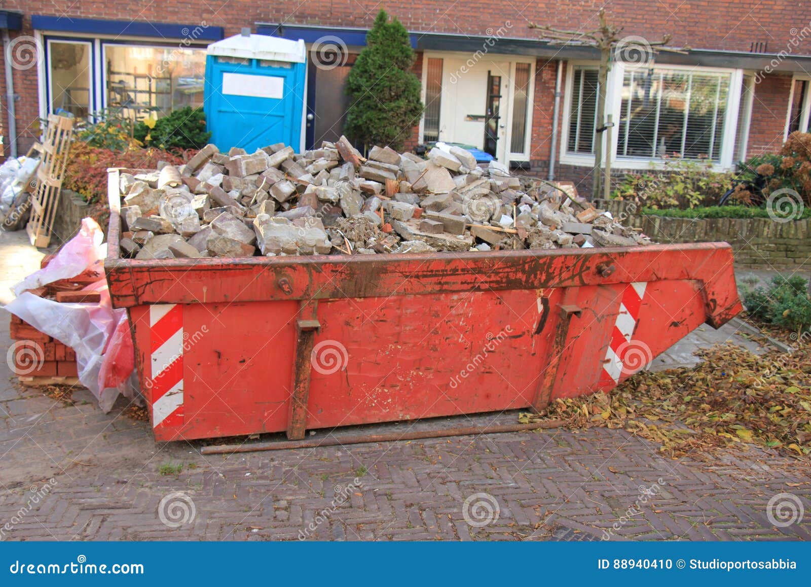 Loaded garbage dumpster stock photo. Image of rubble - 88940410