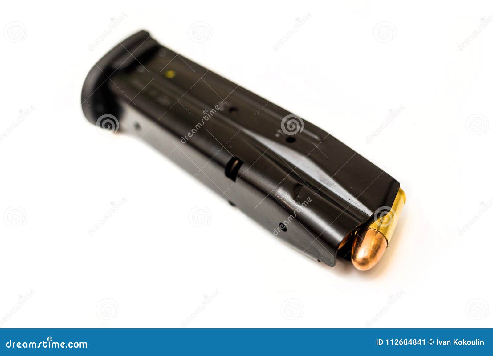 Loaded Handgun Magazine on White Surface Stock Image - Image of ...