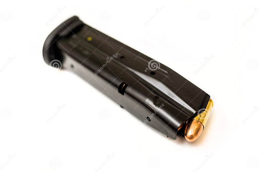 Loaded Handgun Magazine on White Surface Stock Image - Image of ...