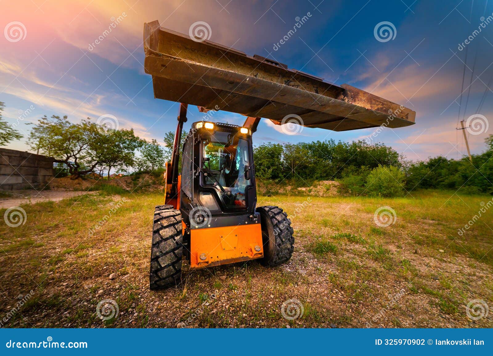 Loader Clears a Construction Site. Land Works for Landscaping. a ...