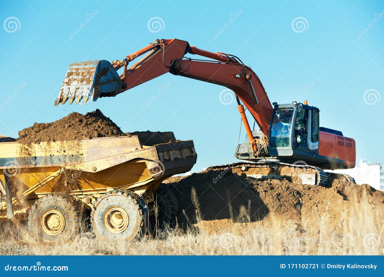 Loader Excavator and Tipper Dumper. Earthmoving Work Stock Image ...