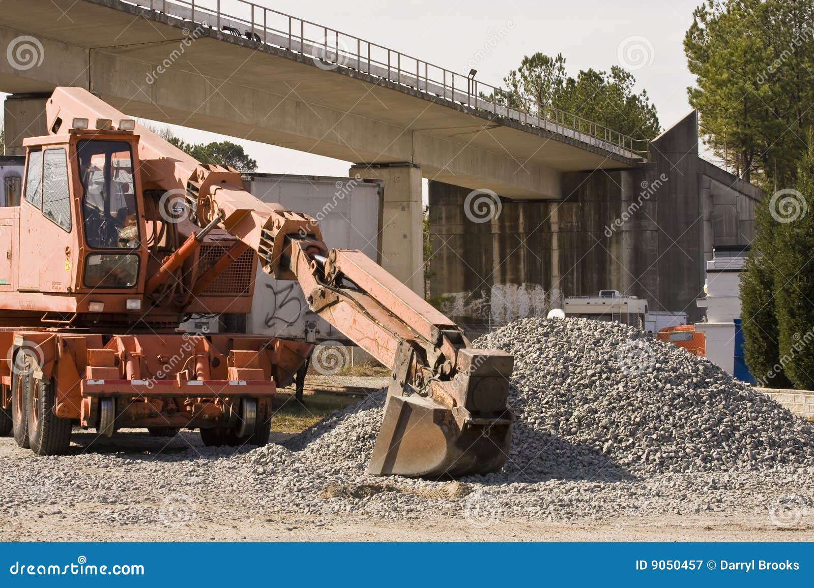 Loader and Gravel Under Bridge Stock Image - Image of loader, heavy ...