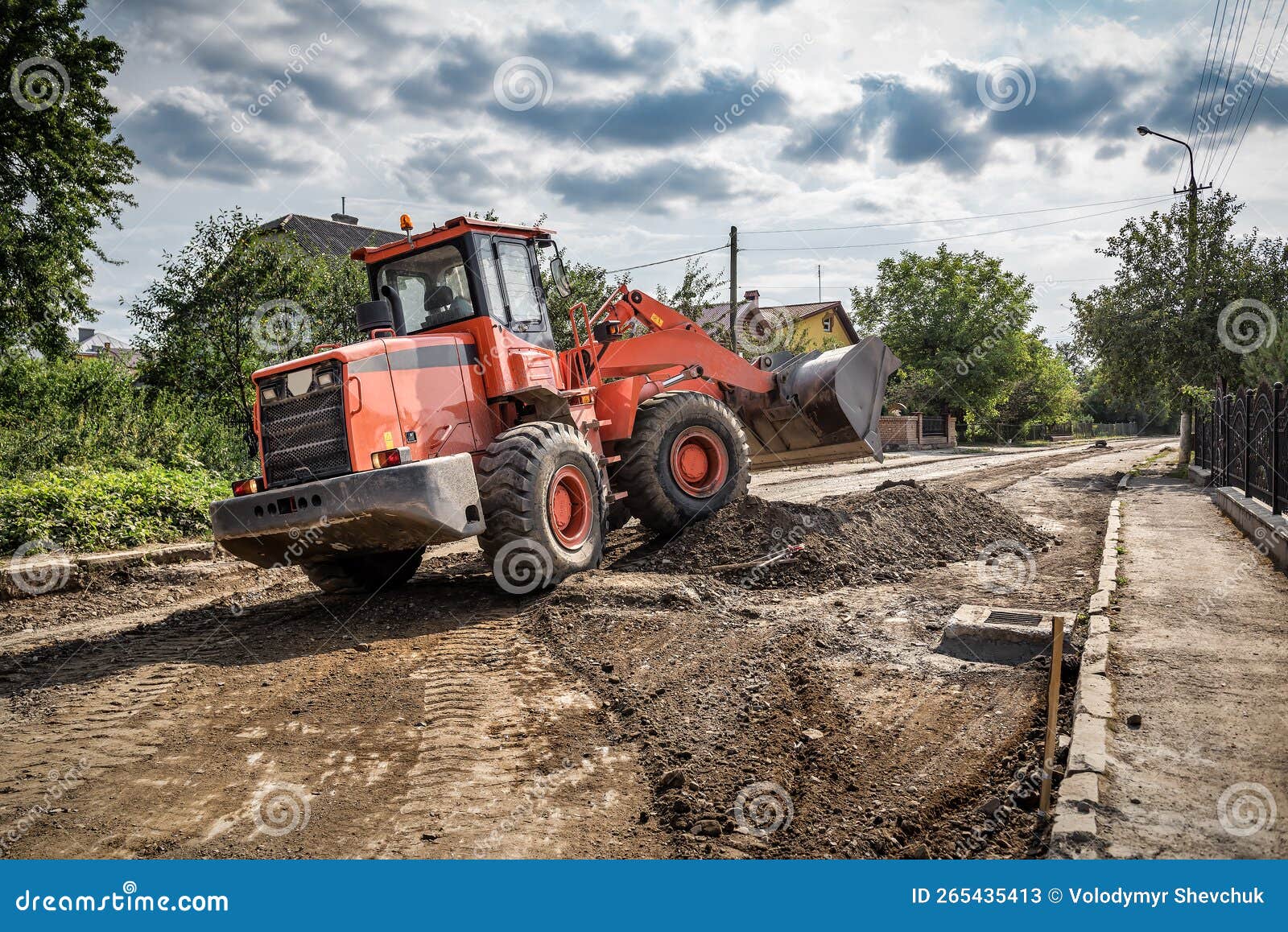 The Loader is Leveling the Foundation for the New Road Stock Image ...