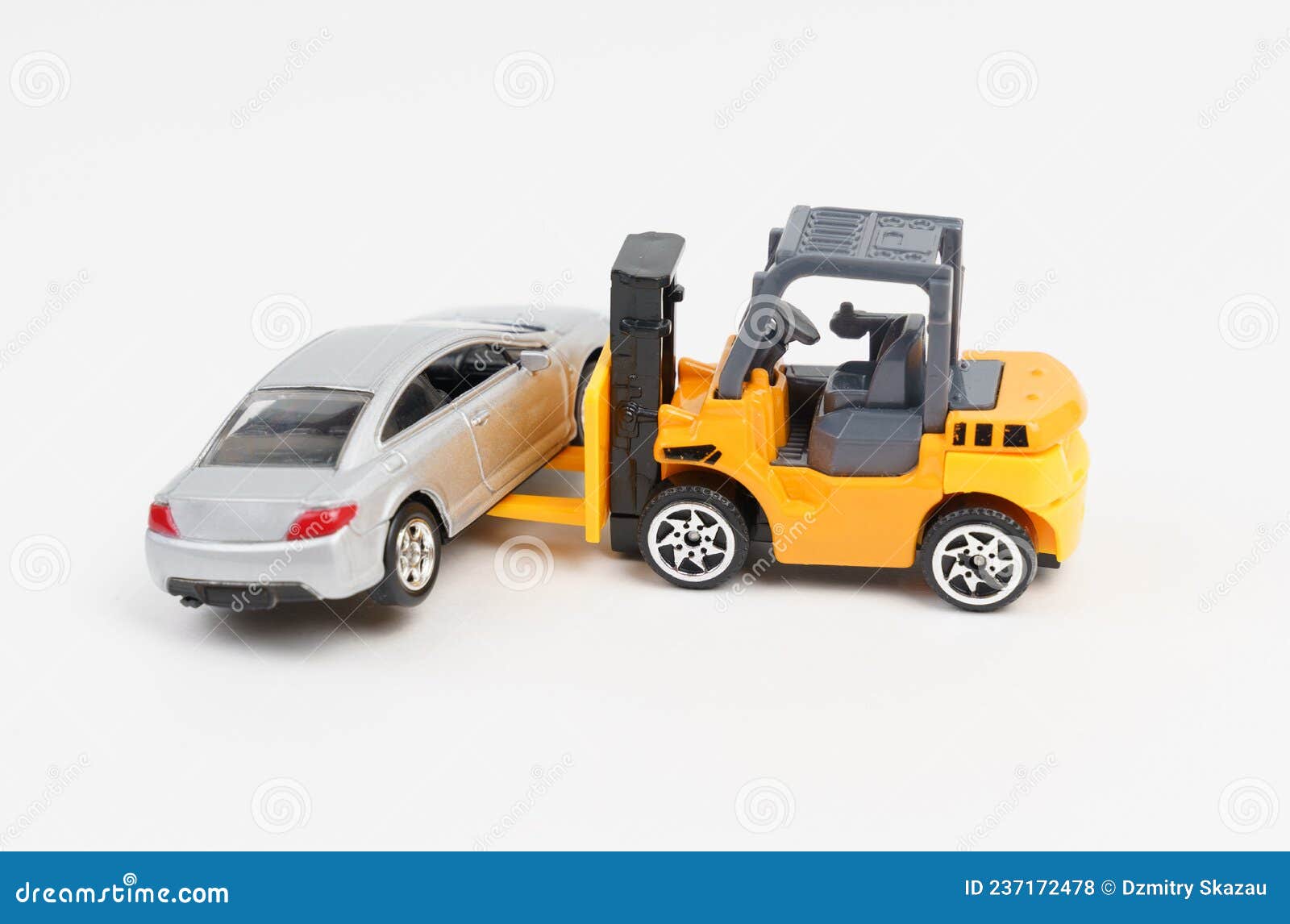 A Loader Moves a Gray Passenger Car. Stock Photo - Image of pallet ...