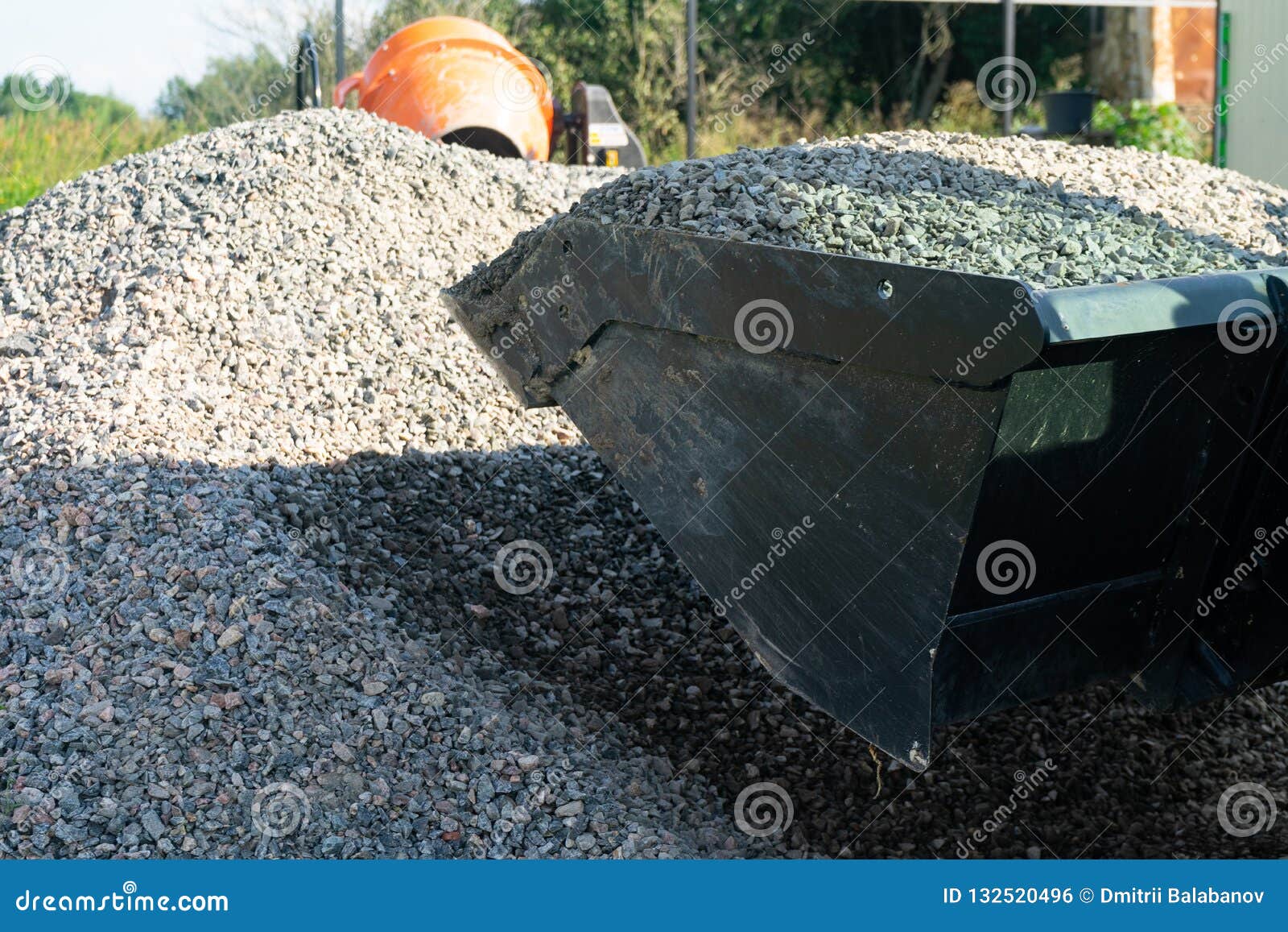 The Loader Picked Up Rubble in the Bucket for Construction Work Stock ...