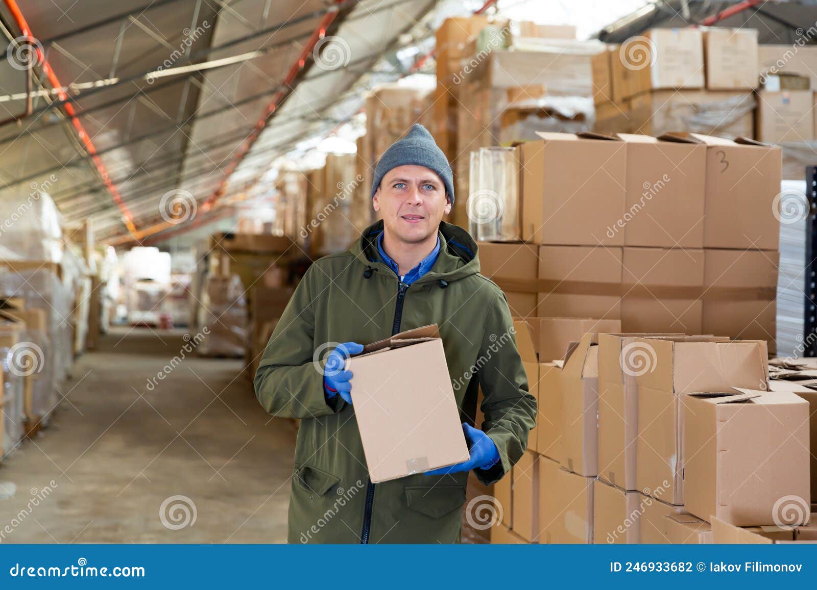 Loader Stacks Various Boxes on Racks in Store Stock Photo - Image of ...