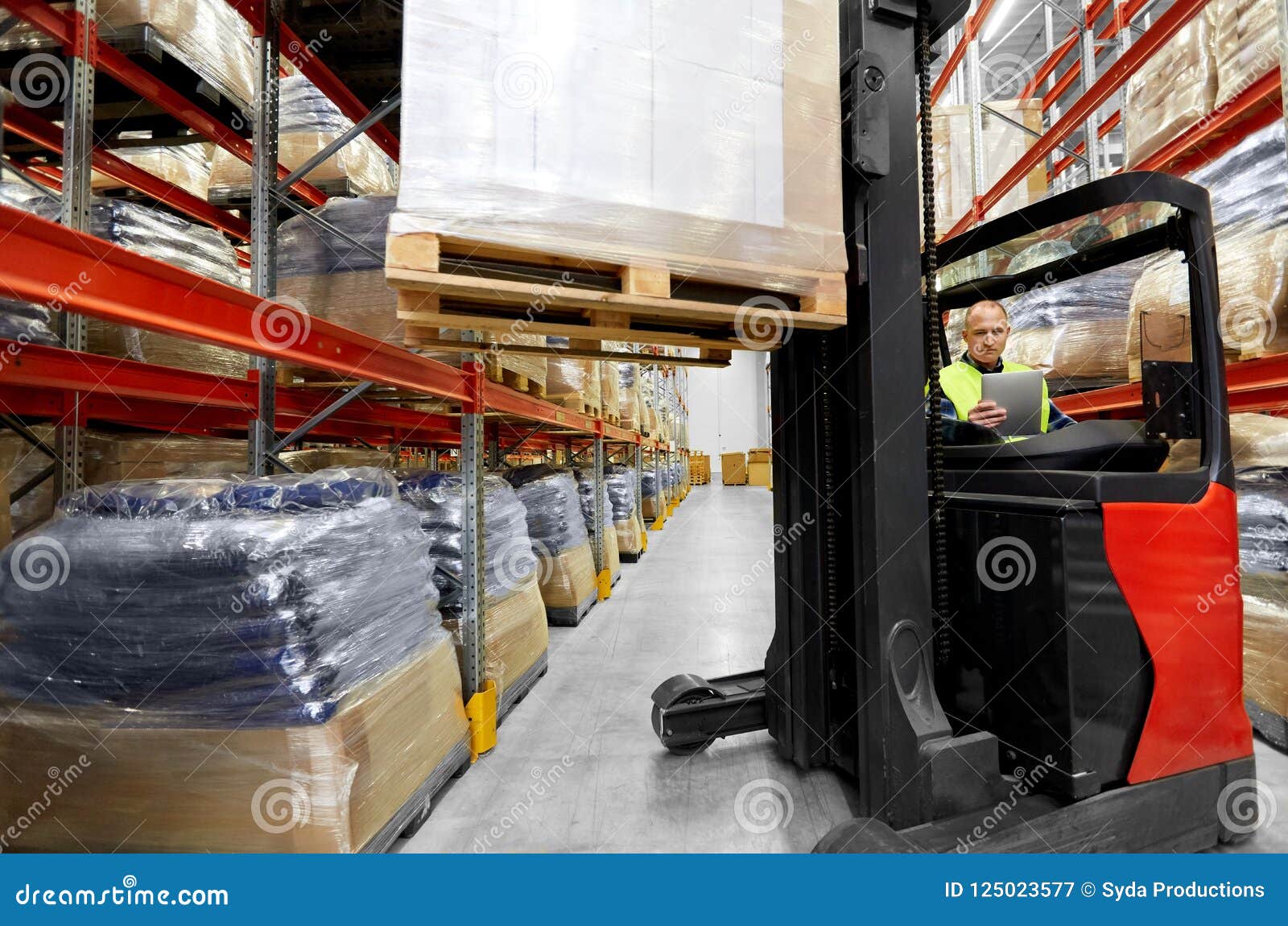 Loader Tablet Pc and Forklift at Warehouse Stock Image - Image of ...