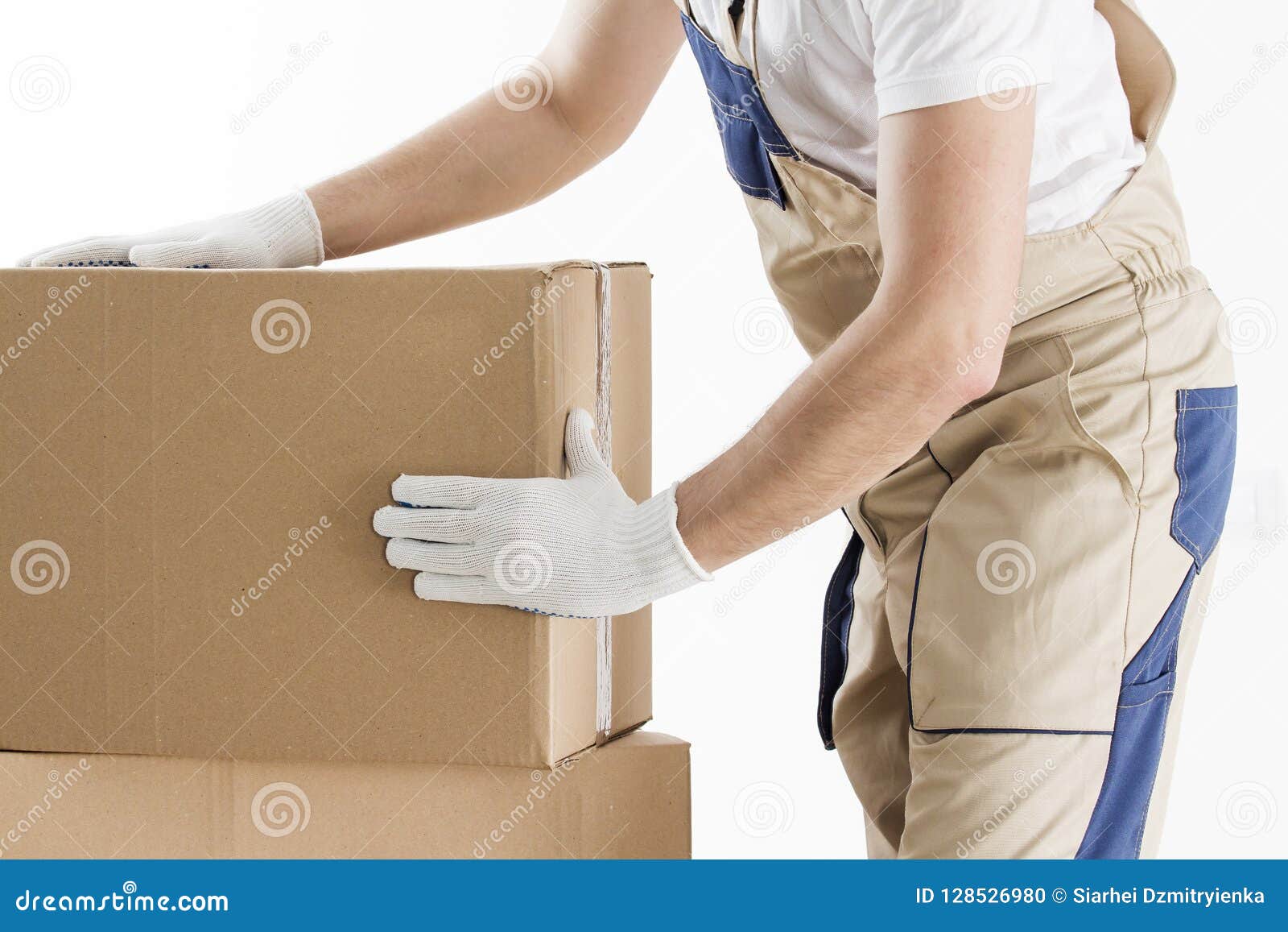 Loader in Uniform with Cardboard Boxes Closeup. Mover at Work ...