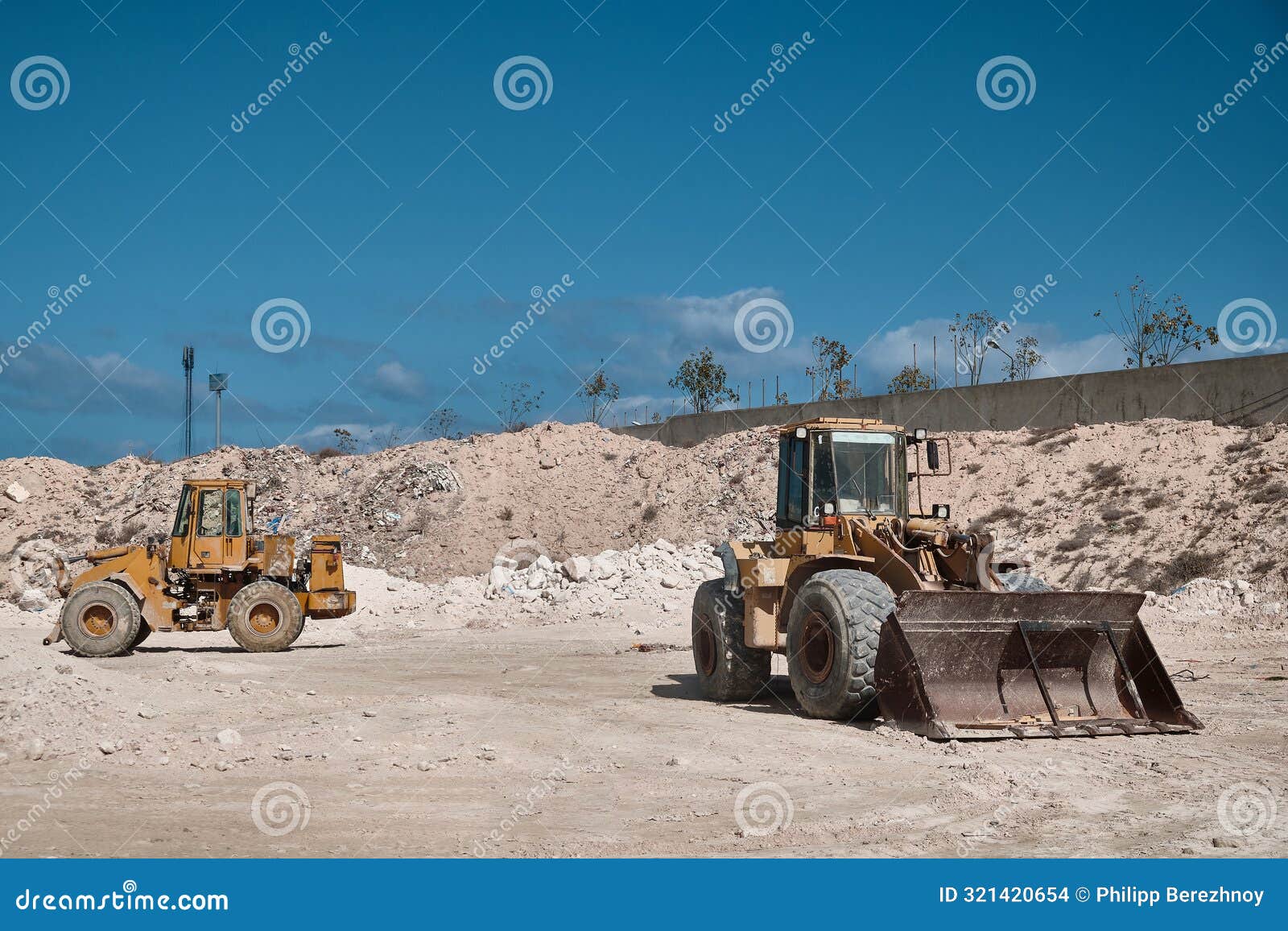 Loaders in a quarry stock photo. Image of machinery - 321420654