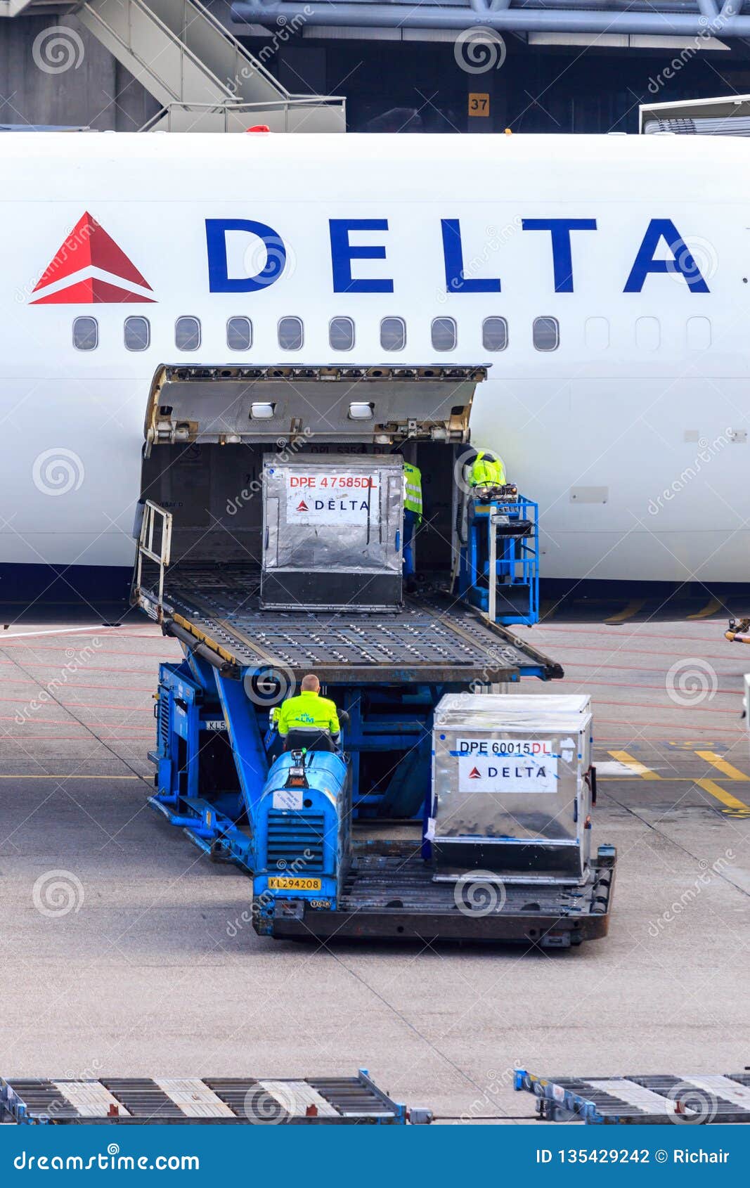 Loading Air Cargo Containers Editorial Photography - Image of airplane ...
