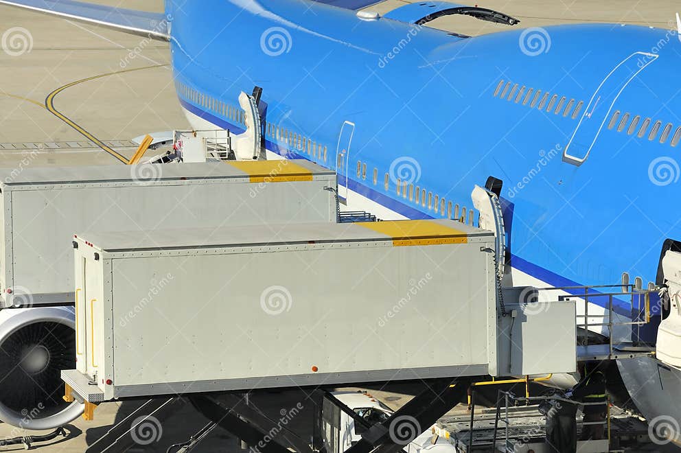 Loading an airplane stock image. Image of transport, door - 8260821