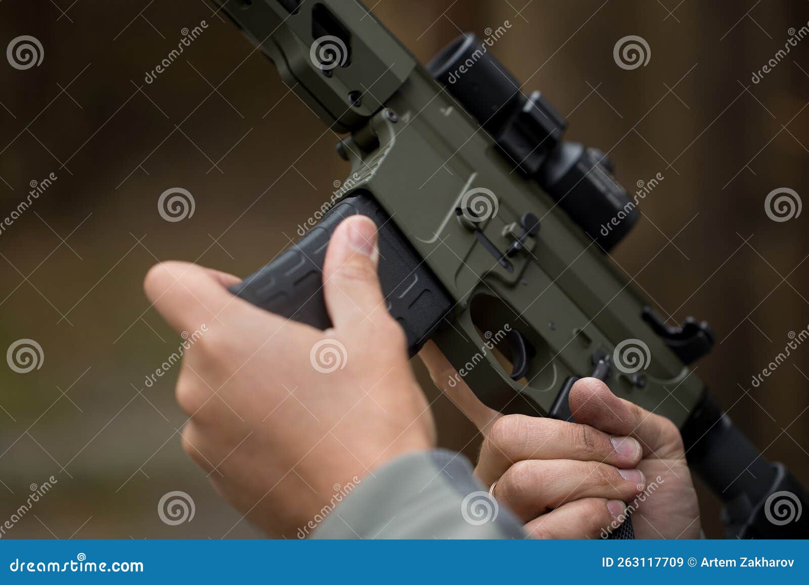 Loading Ammunition into a Clip. Reloading Weapons. Stock Image - Image ...