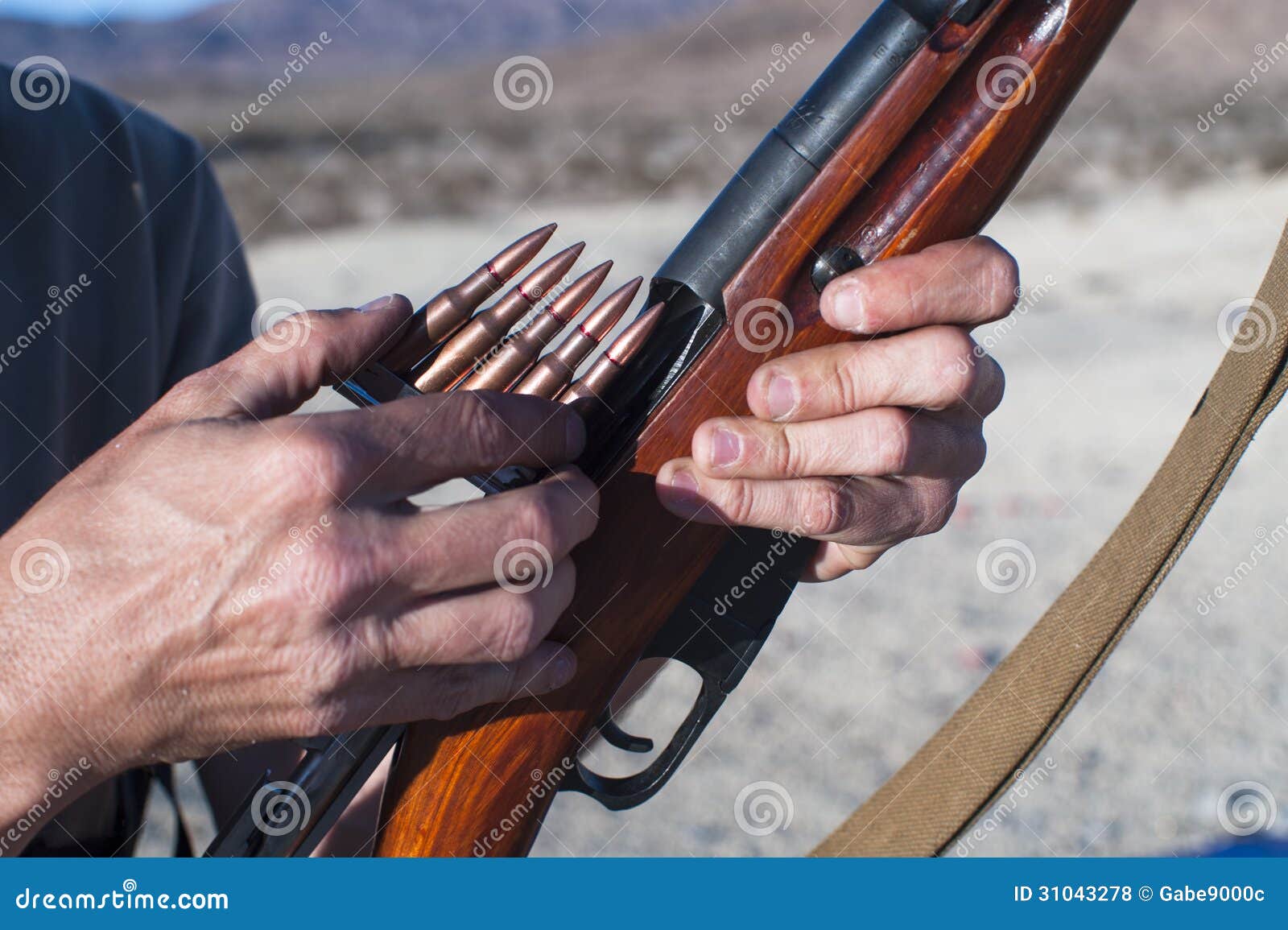 Loading Ammunition into Rifle Stock Photo - Image of guns, control ...