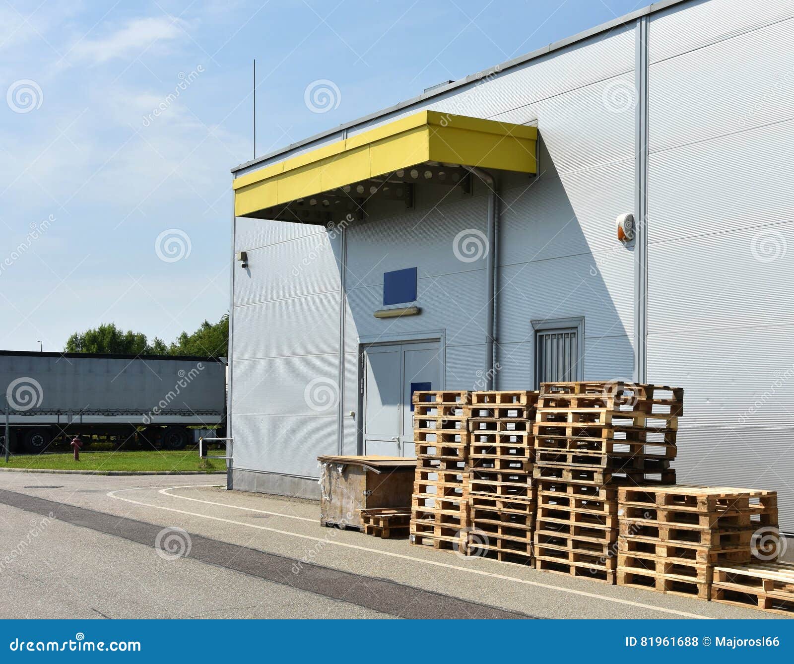 Loading Area of a Warehouse Building Stock Photo - Image of park, blue ...