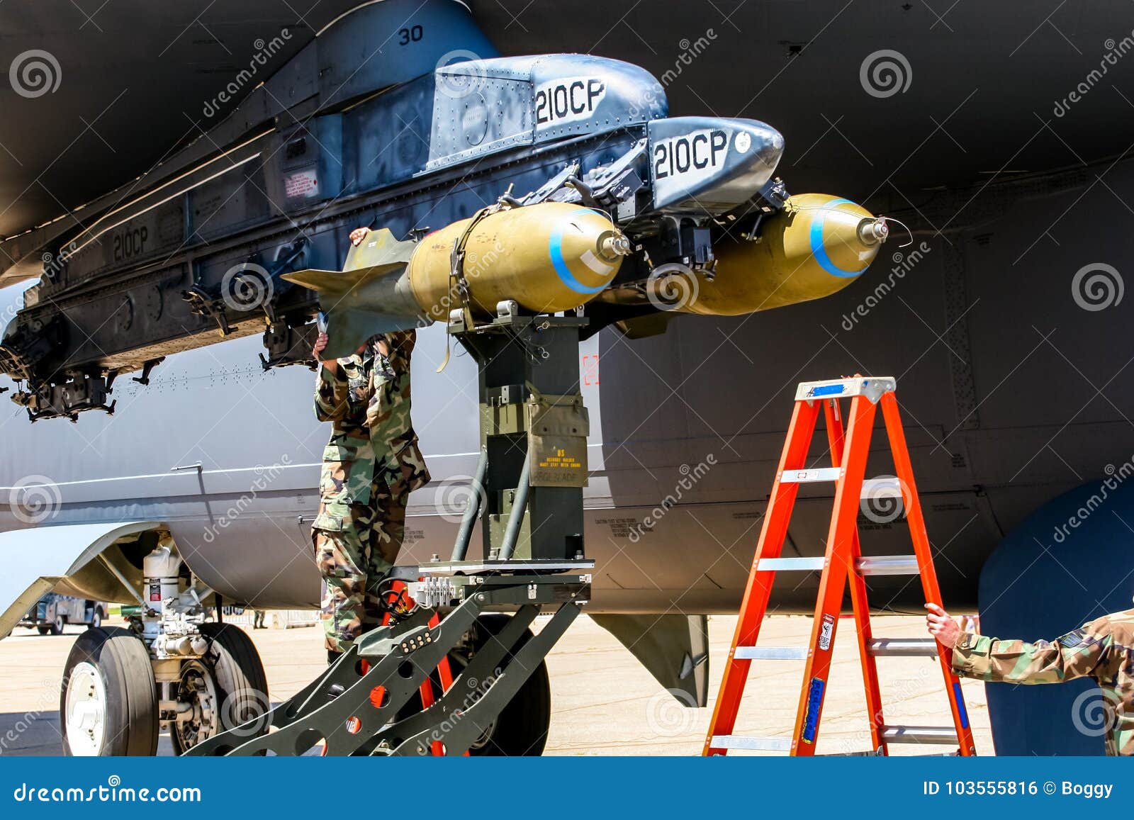 Loading Bombs on B-52 Bomber Editorial Photo - Image of bombs, 1933: ...