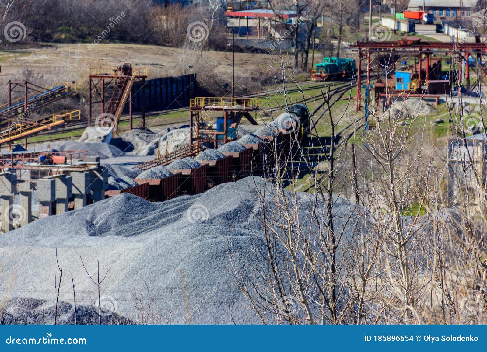 Loading Breakstone into Freight Train in Granite Quarry Stock Photo ...