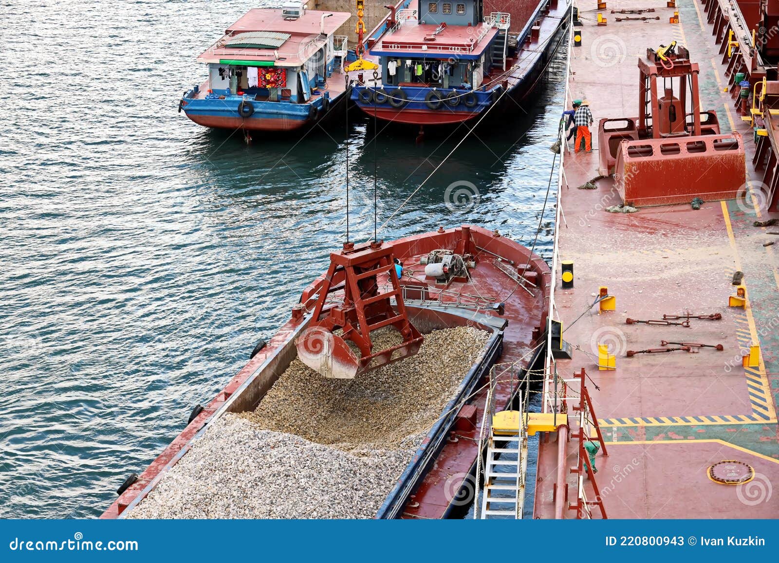 Loading Bulk Cargo of Limestone from Barges into a Bulk Carrier by ...