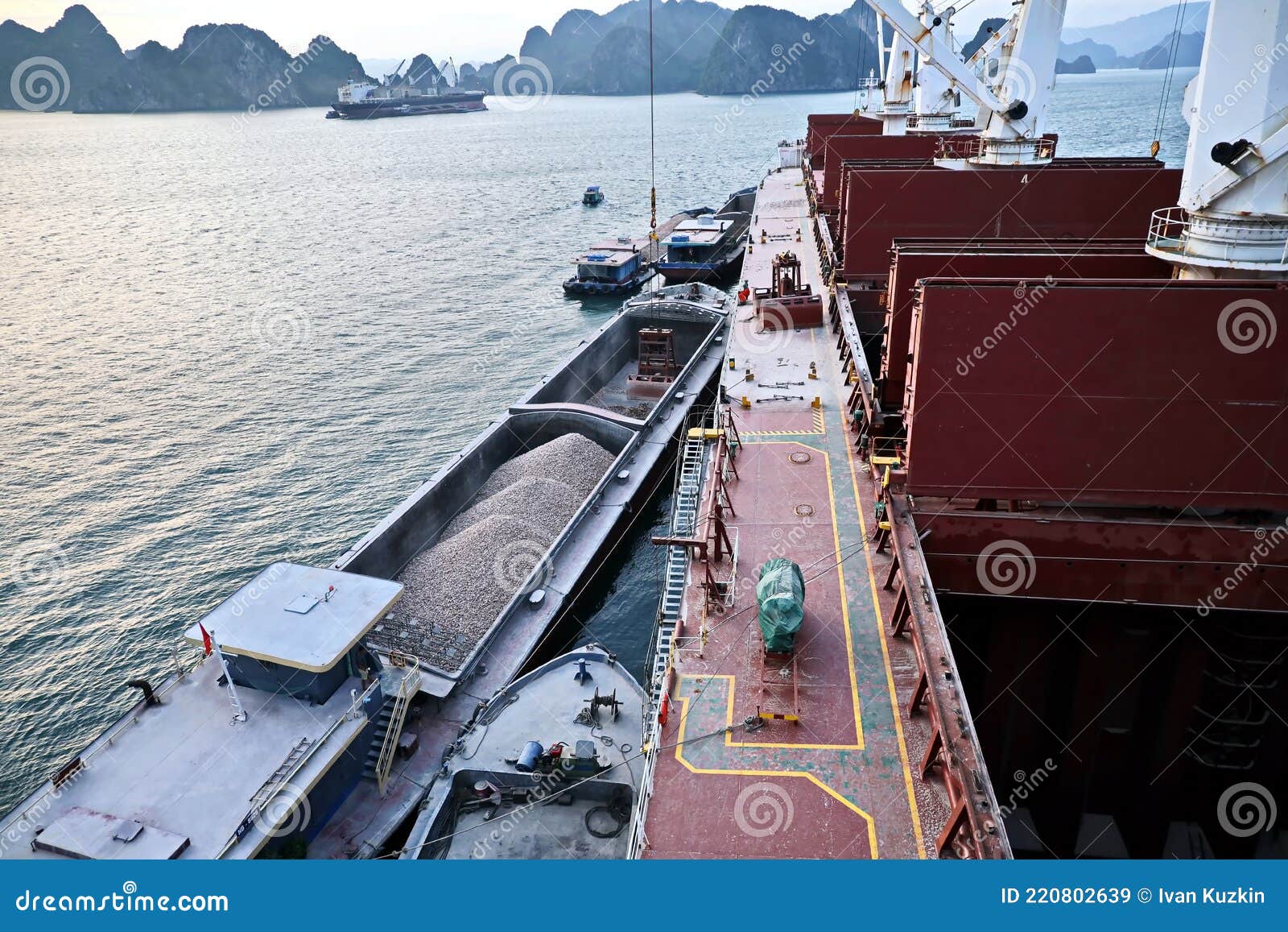 Loading Bulk Cargo of Limestone from Barges into a Bulk Carrier by ...