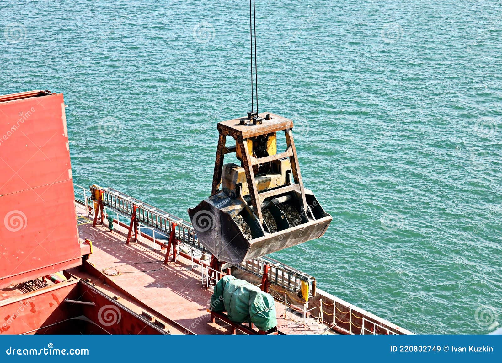Loading Bulk Cargo of Limestone from Barges into a Bulk Carrier by ...