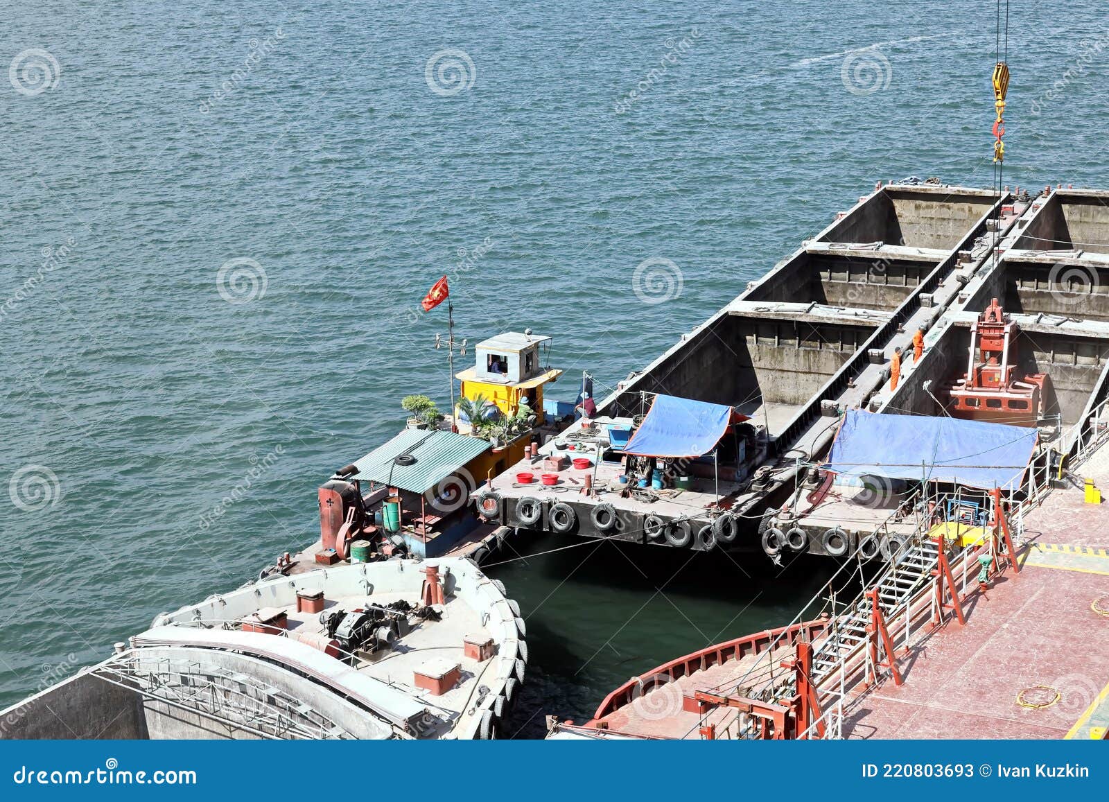 Loading Bulk Cargo of Limestone from Barges into a Bulk Carrier by ...