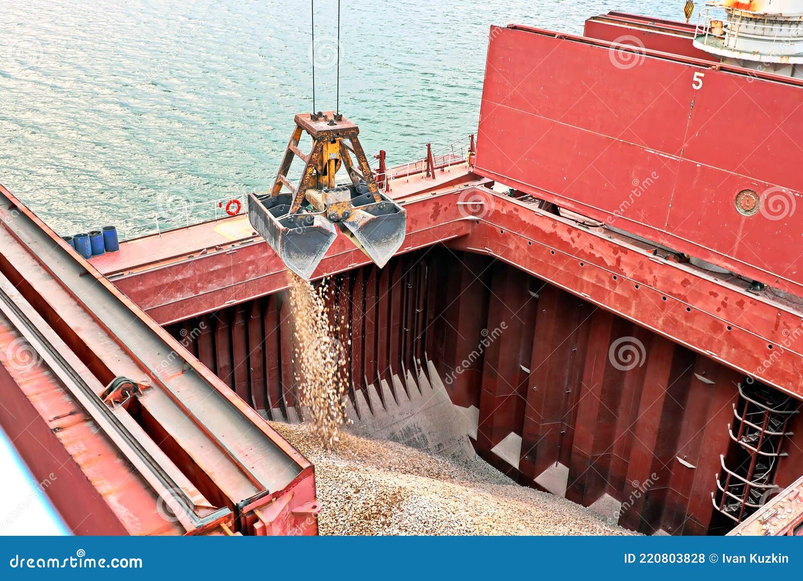Loading Bulk Cargo of Limestone from Barges into a Bulk Carrier by ...