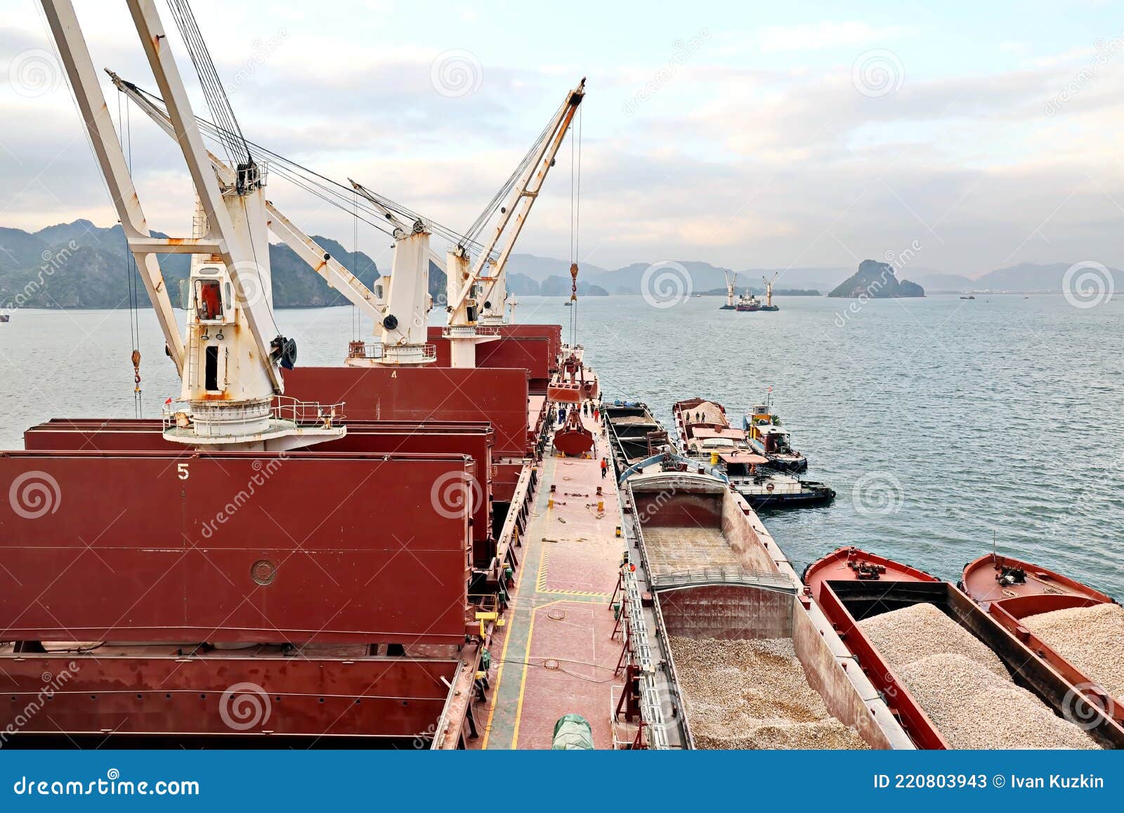 Loading Bulk Cargo of Limestone from Barges into a Bulk Carrier by ...