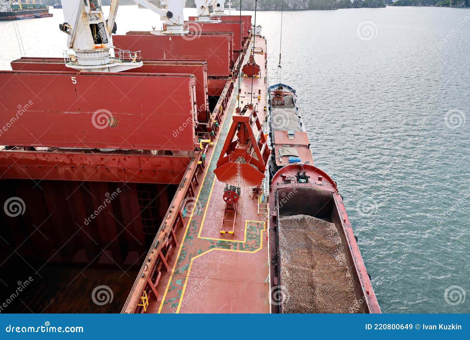 Loading Bulk Cargo of Limestone from Barges into a Bulk Carrier by ...