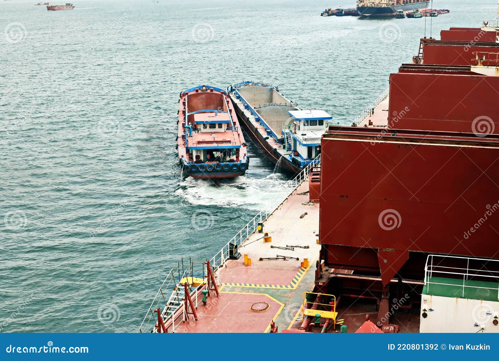 Loading Bulk Cargo of Limestone from Barges into a Bulk Carrier by ...