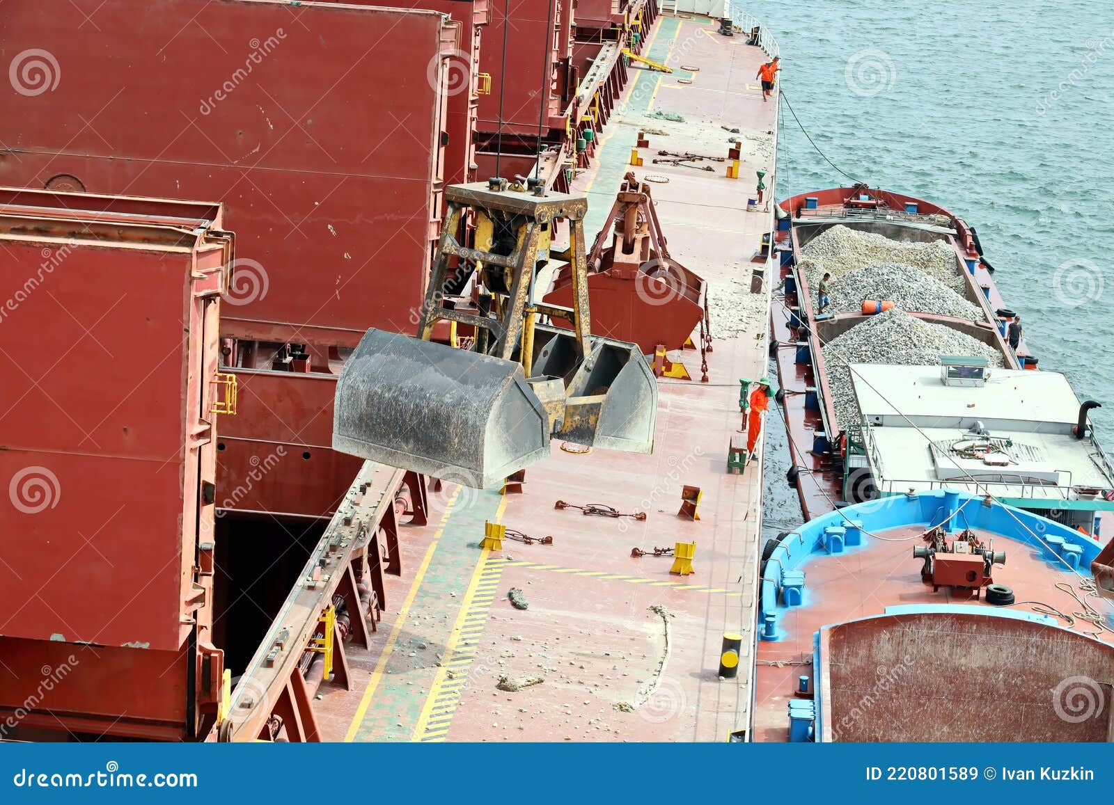 Loading Bulk Cargo of Limestone from Barges into a Bulk Carrier by ...
