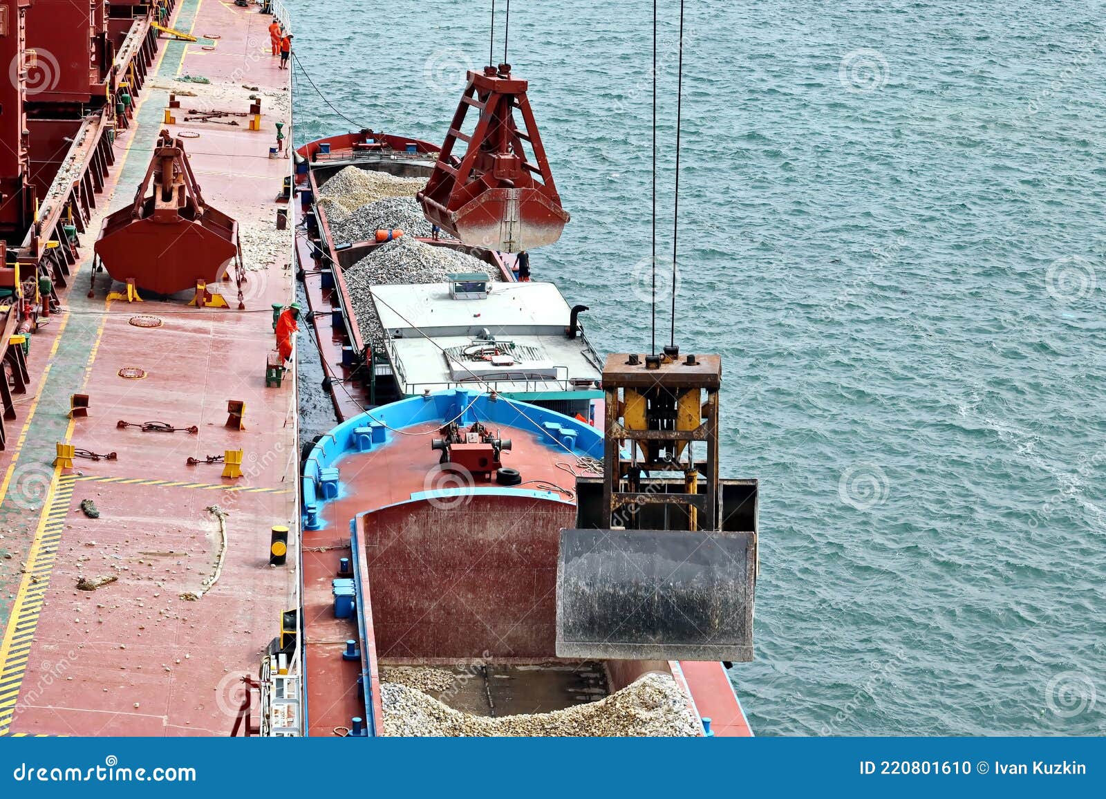 Loading Bulk Cargo of Limestone from Barges into a Bulk Carrier by ...