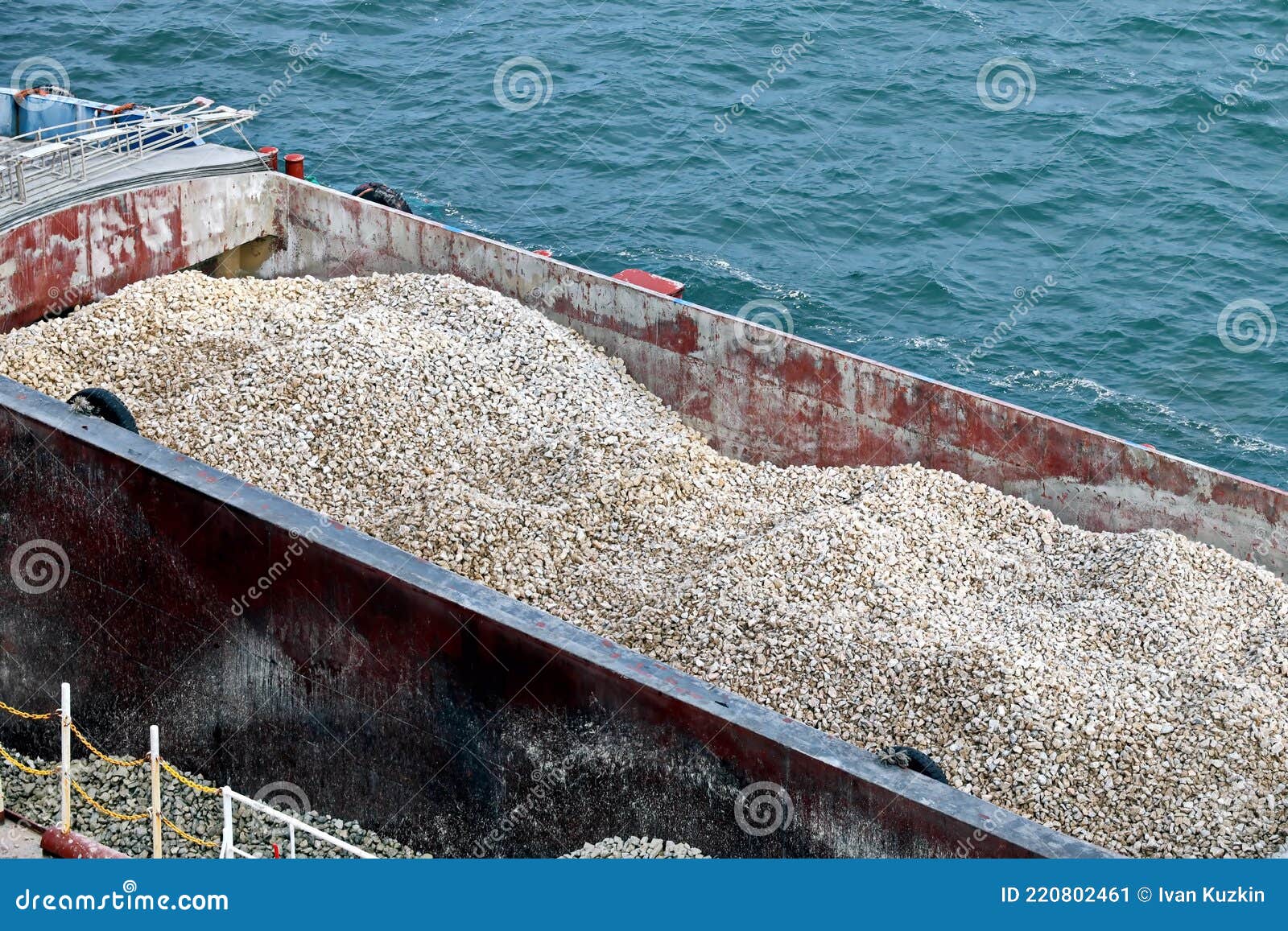 Loading Bulk Cargo of Limestone from Barges into a Bulk Carrier by ...